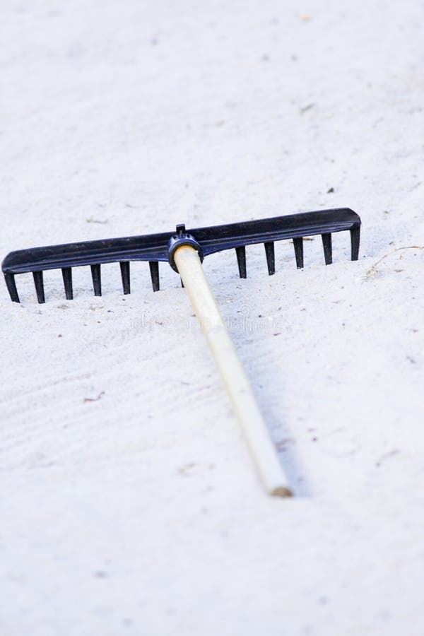 Rake on sand stock image. Image of recreation, coast - 24502373