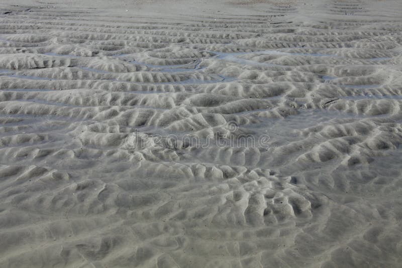 Sand relief on a beach stock photo. Image of speck, sand - 108036292