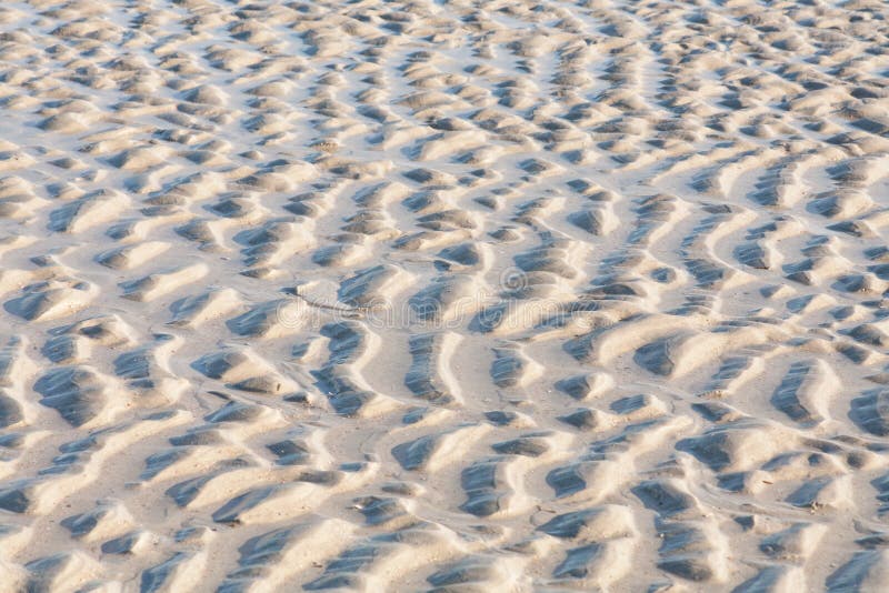 Sand ripples on the beach stock image. Image of tranquil - 68761505