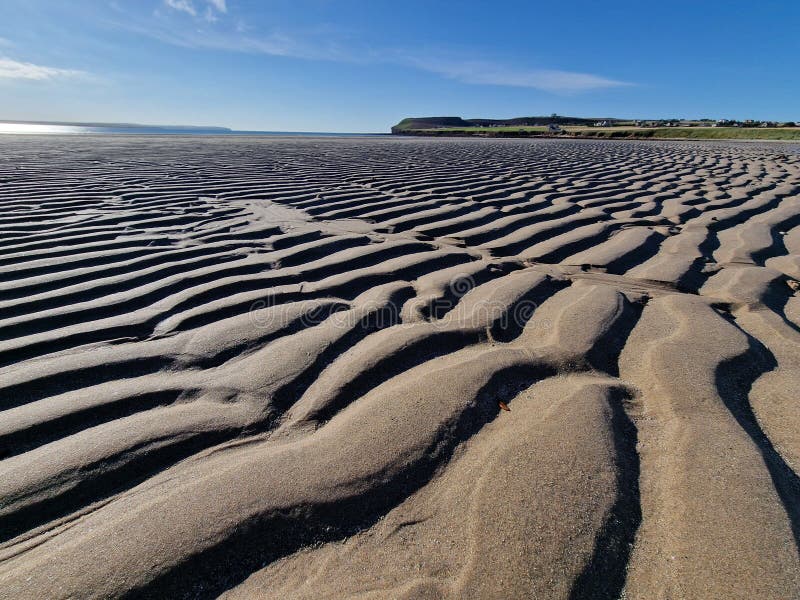 Sand Ripples Under the Sunlight Against the Blue Sky on a Bright Day ...