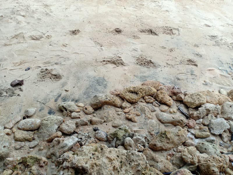 Sand and rocks stock image. Image of pink, wadi, coast - 265565471