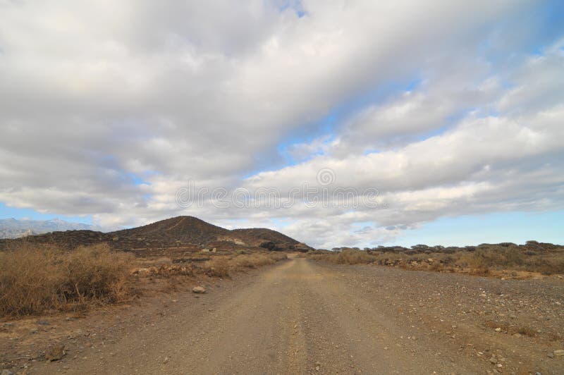 Sand and Rocks Road in the Desert Stock Photo - Image of track, country ...