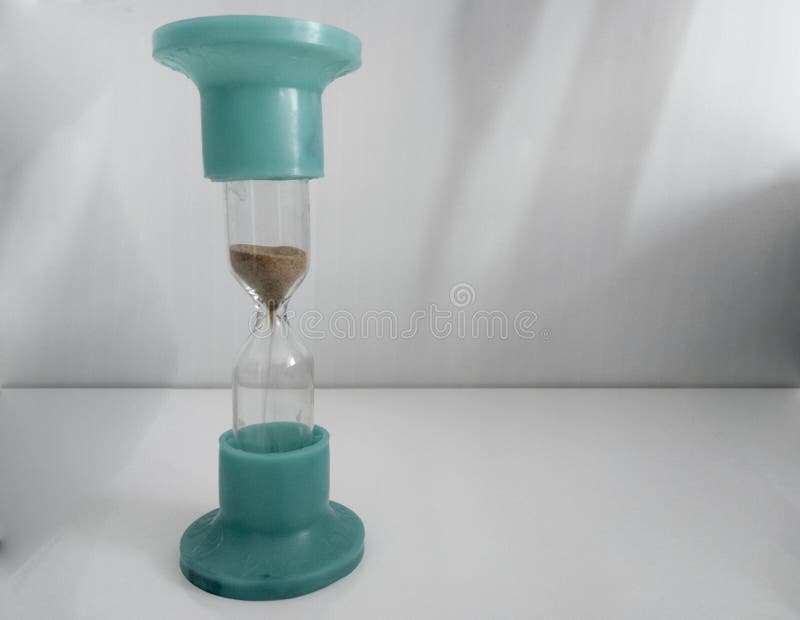 Sand Running through the Bulbs of an Hourglass Measuring the Passing ...