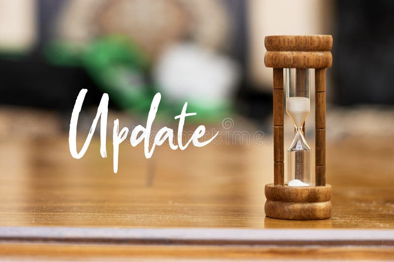 Sand Running through the Bulbs of an Hourglass with UPDATE in Loading ...