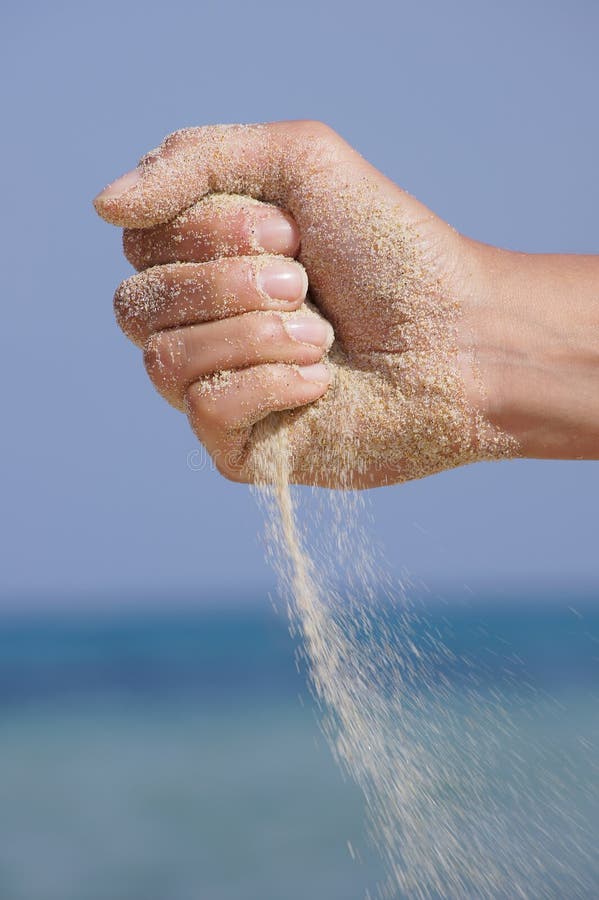 Sand Running through Hands As a Symbol for Time Running, Lost Stock ...