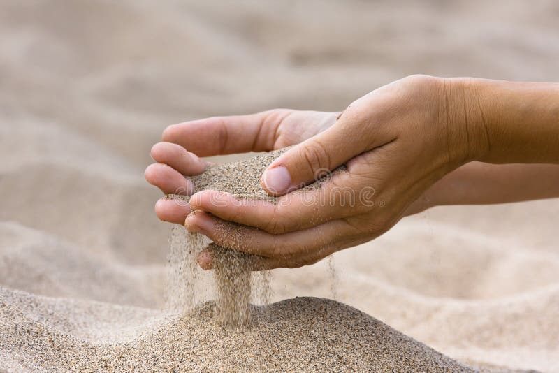 Sand Running through Hands of Woman Stock Image - Image of female ...