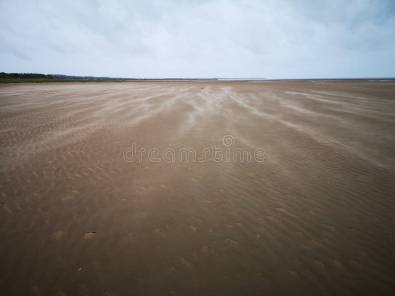 Sand rushing in the wind stock photo. Image of sand - 165103558