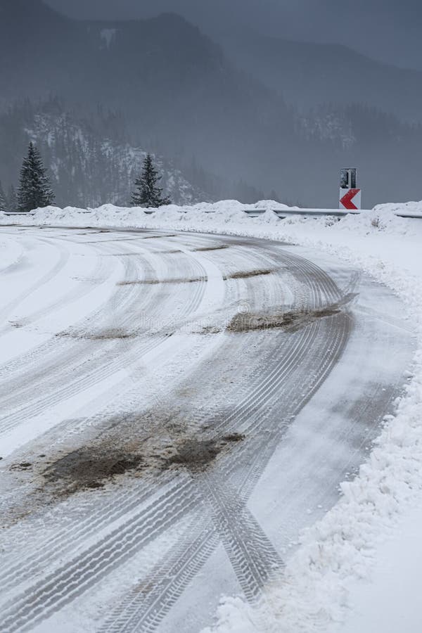 Sand and Salt Spread on a Mountain Road after a Massive Snowfall Stock ...
