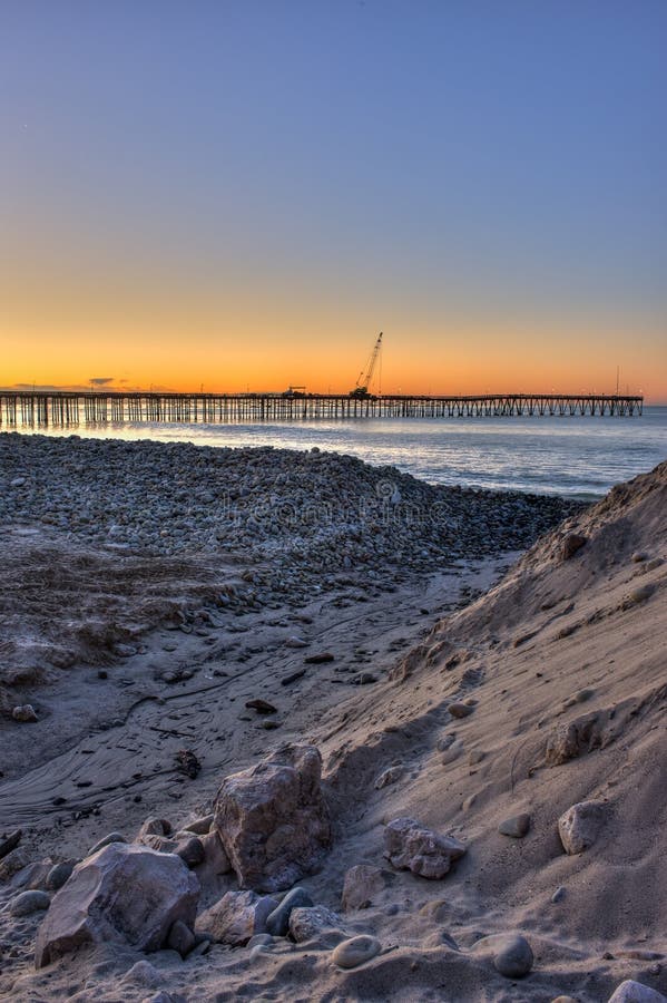 Sand Slopes Back To the Water Stock Photo - Image of morning, lights ...