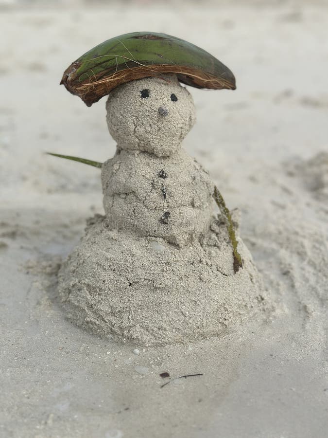 Sand snowman stock image. Image of coconut, snowman - 303638399