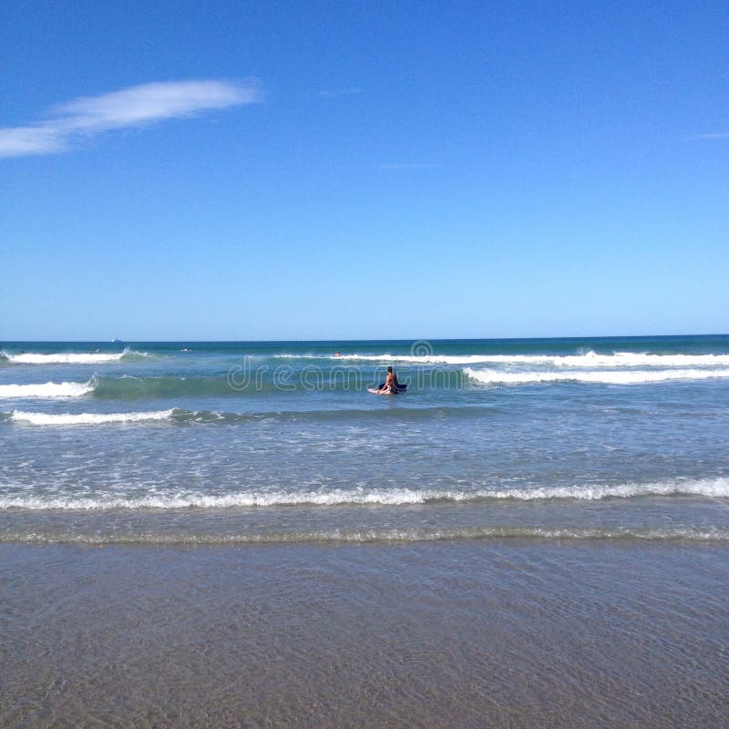 Sand soaked stock photo. Image of tide, cloud, wave, ocean - 68508690