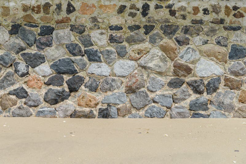 Sand with Stone Wall on the Beach Stock Image - Image of space, outdoor ...