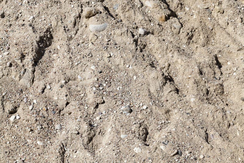 Sand with stones stock photo. Image of structure, simplicity - 223275074