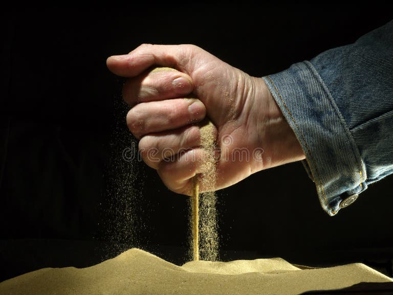Sand strewed from a fist stock photo. Image of sprinkle - 38369786