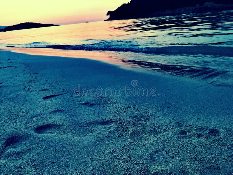 Sand and sunset stock image. Image of nature, sand, wather - 133847813