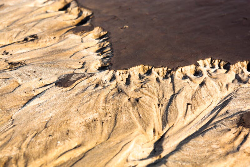 Sand Surface with the Relief Formed by Water Currents Stock Photo ...