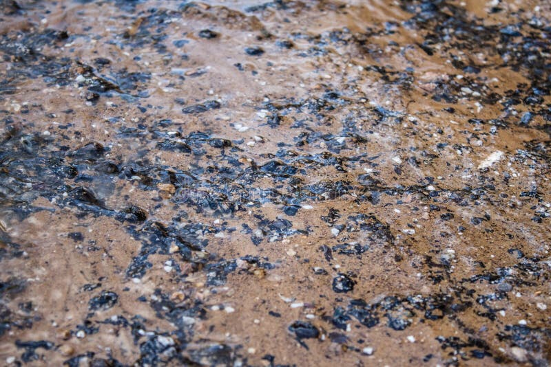 Sand and Tarmac Under Water from Melted Snow Texture Stock Photo ...