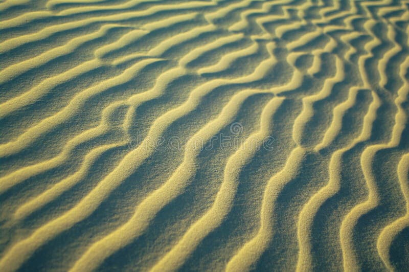 Diagonal sand woman stock image. Image of legs, design - 102504085