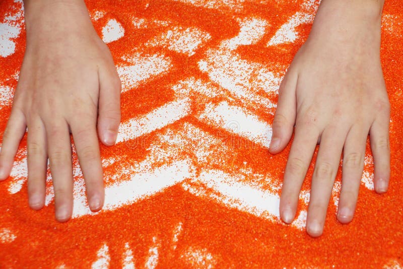 Sand Therapy, Children`s Hands Touch the Orange Artificial Sand Stock ...