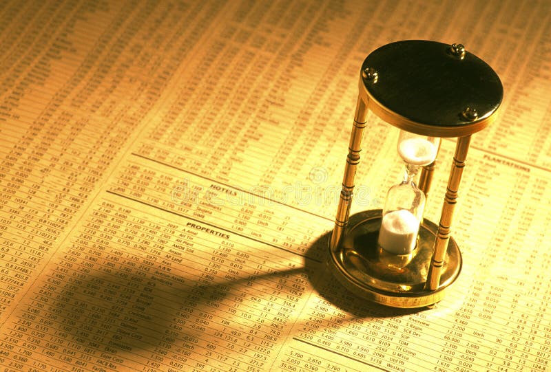 Sand timer on stock index stock photo. Image of machine - 52724218