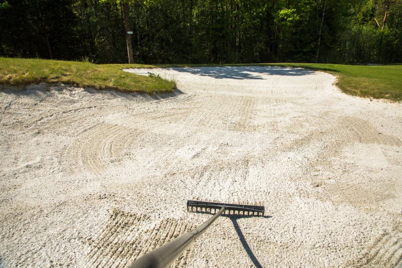 Sand Trap, Rake in a Golf Course Sand Bunkers, Raking the Sand Stock ...