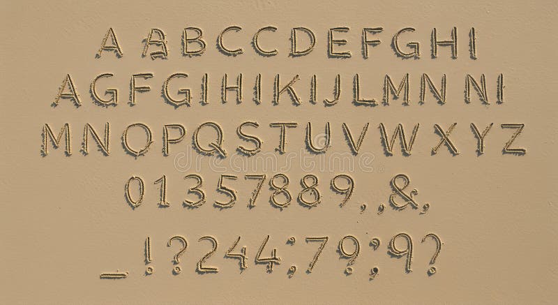 Sand Typography Alphabet, Numbers and Punctuation Marks Drawn on the ...