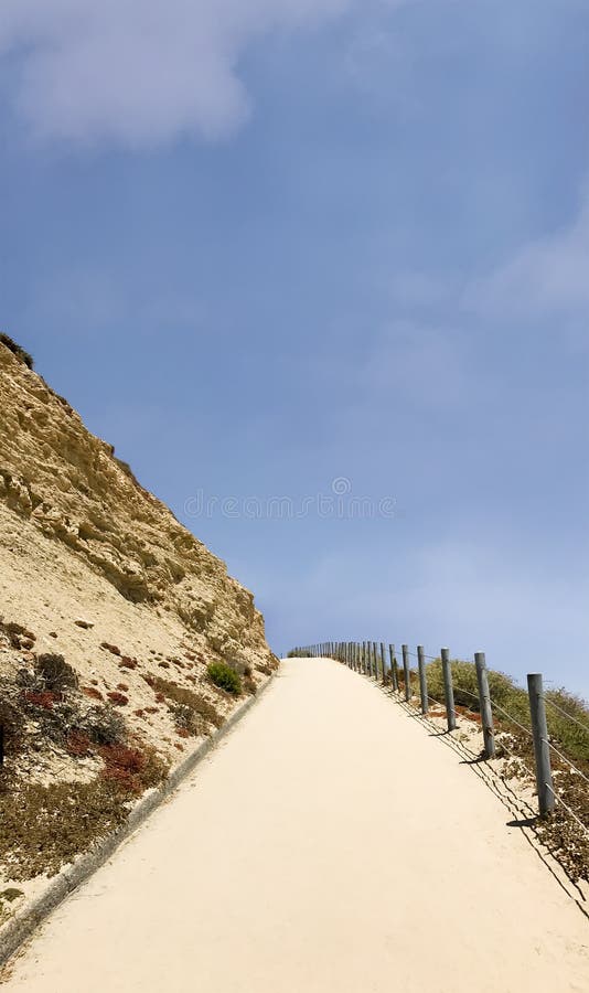 Sand Walkway on a Hill stock photo. Image of clouds, hill - 96290930