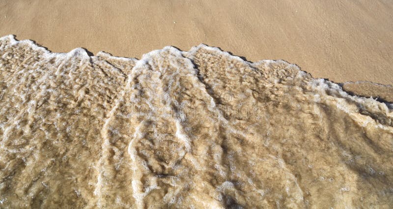 Sand Washed with Water from the Sea Stock Photo - Image of grain ...