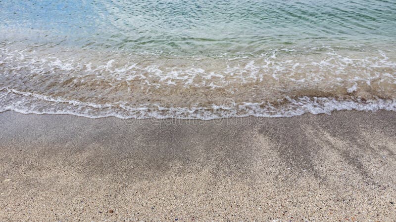 Sand and Waves in the Beach Stock Photo - Image of surf, holiday: 136275414