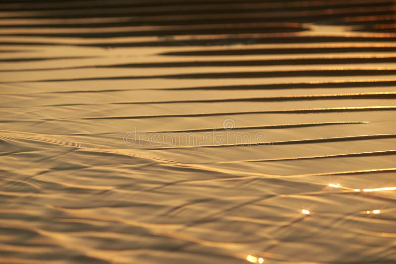 Sand Waves Texture with Water on the Sea Beach. Yellow Sand Texture for ...