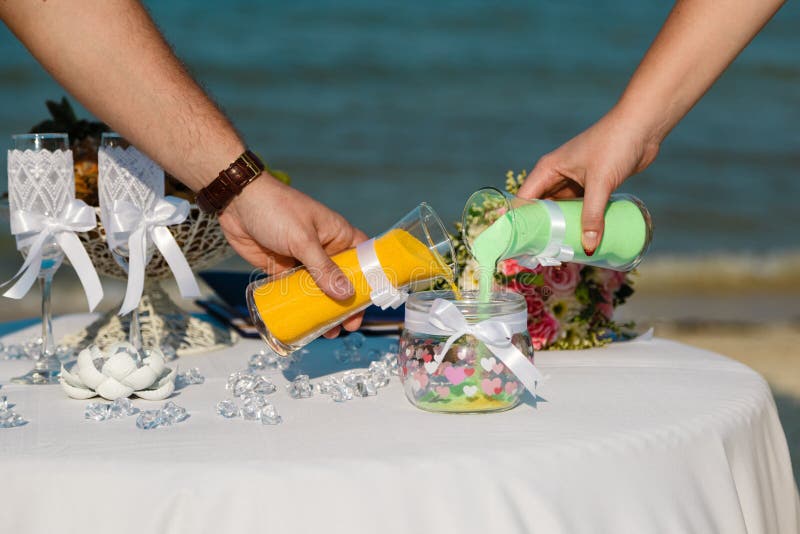 Sand wedding ceremony stock image. Image of bride, table - 48946533