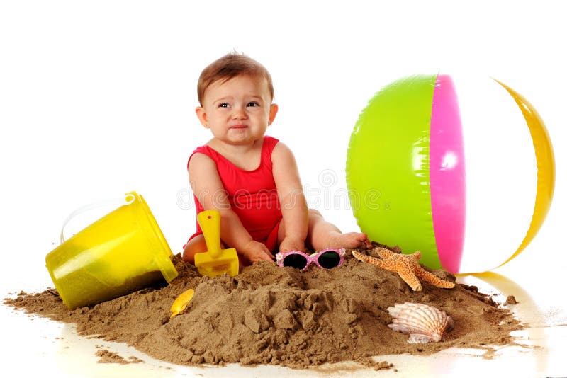 Sand is Yucky! stock photo. Image of baby, white, swim - 14401872