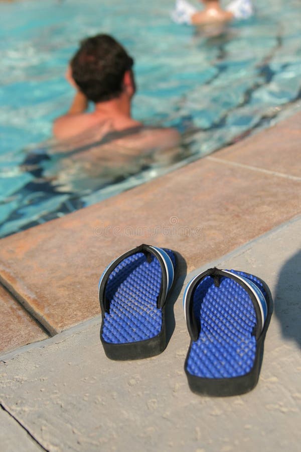Sandals and pool stock photo. Image of sandal, cool, party - 948918