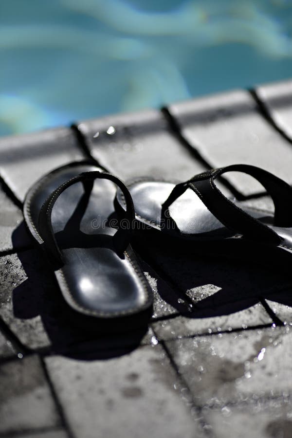 Sandals at poolside stock image. Image of tropical, summertime - 3179873