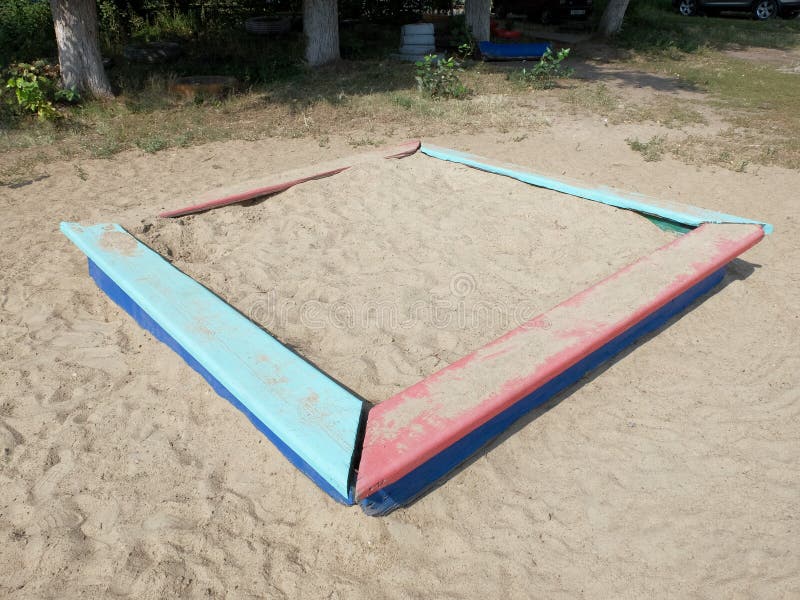 Sandbox on the playground stock photo. Image of grass - 98860888