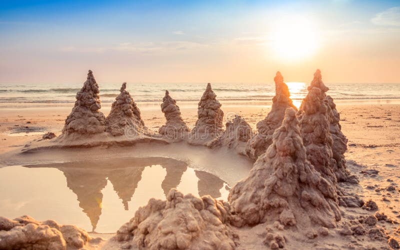 Sandcastle on the Beach with Beautiful Sunset Sky in Summer Vacation ...