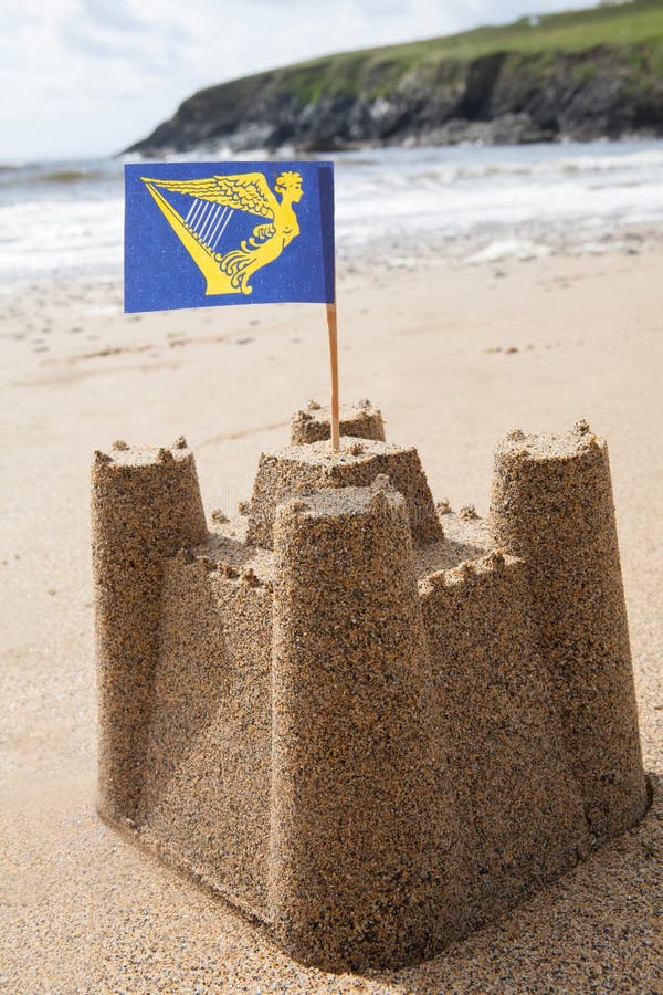 Sandcastle on Beach Flying Irish Flag Stock Image - Image of outdoors ...