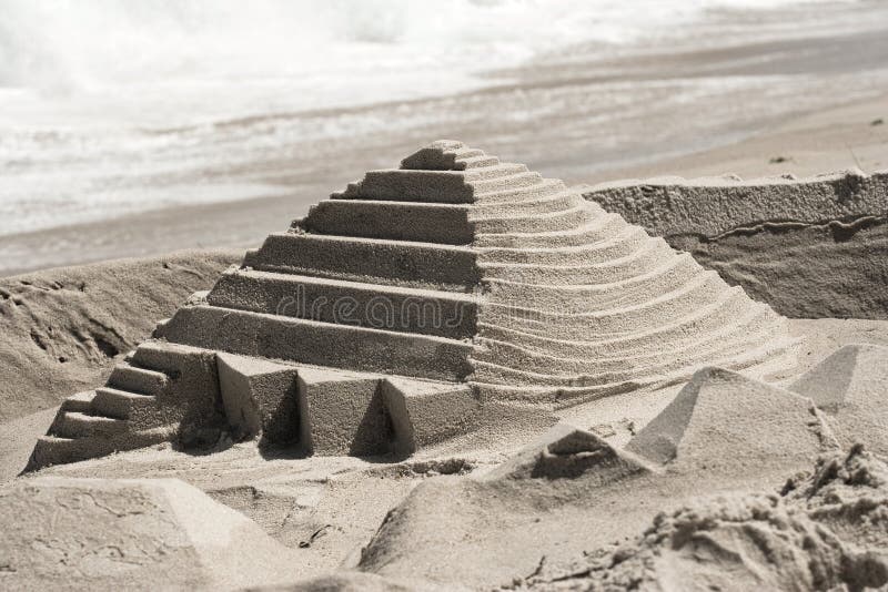 Pyramid Shaped Sand Castle stock photo. Image of sand - 3415540
