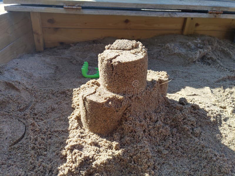 Sandcastle in the sandbox stock photo. Image of sandcastle - 191112400
