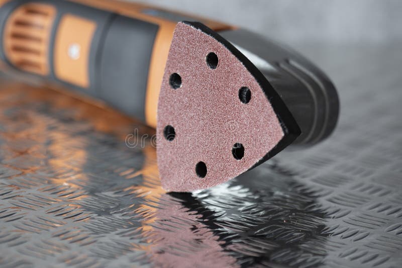 Sanding Attachment, with Sandpaper, on an Electric Sander and Cutting ...