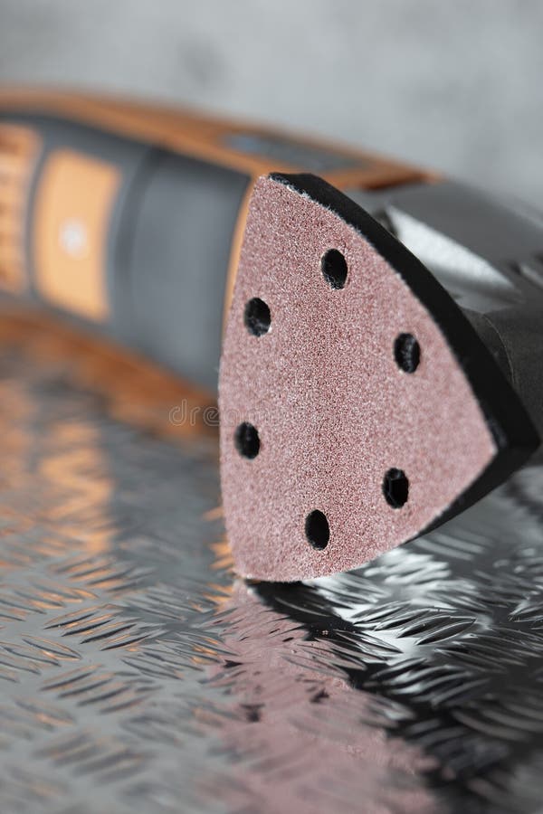 Sanding Attachment, with Sandpaper, on an Electric Sander and Cutting ...