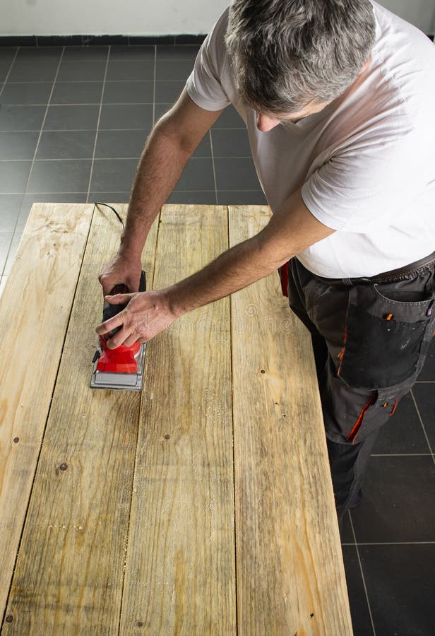 Sanding Machine in Male Hand Stock Image - Image of hand, cable: 303780187