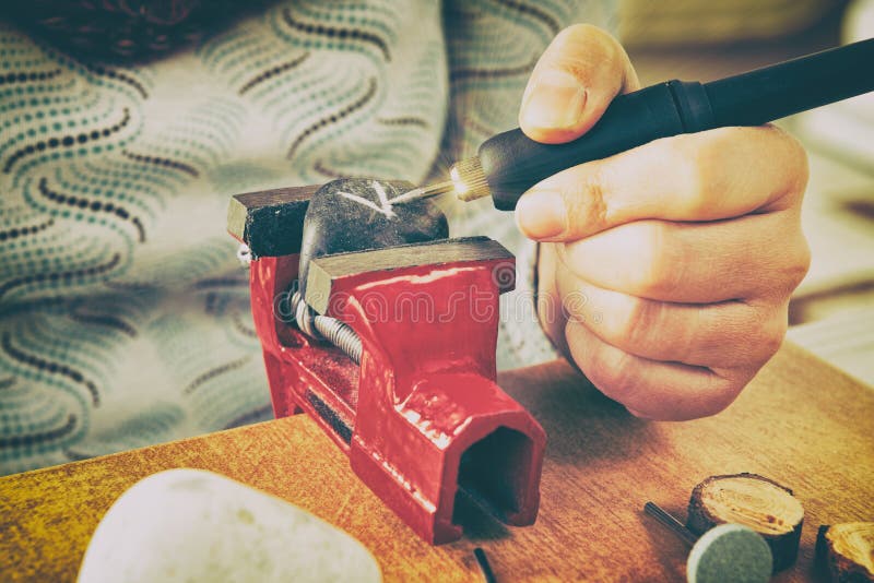 Sanding Rock with Rotary Multi Tool Stock Image - Image of decorate ...