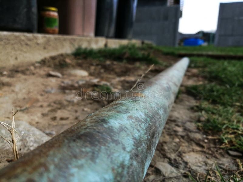 Sanding Rust on a Green Iron Rod Stock Photo - Image of wheel, cleaning ...