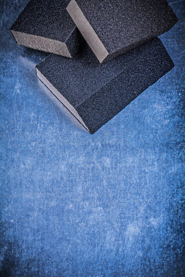 Sanding Sponges on Scratched Metallic Background Abrasive Materi Stock ...