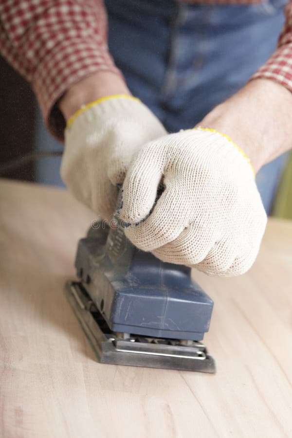 Sanding the wood stock photo. Image of vertical, wooden - 22089830
