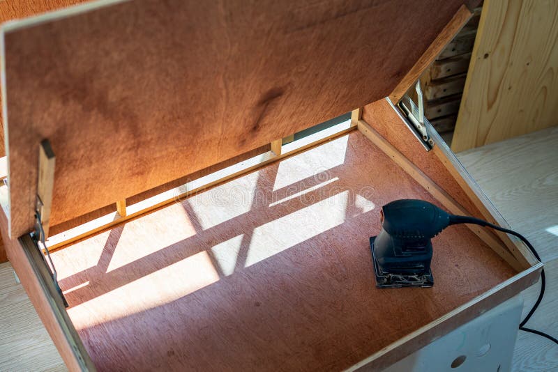 Sanding Wood Machine Resting on the Wooden Table Compartment in the ...