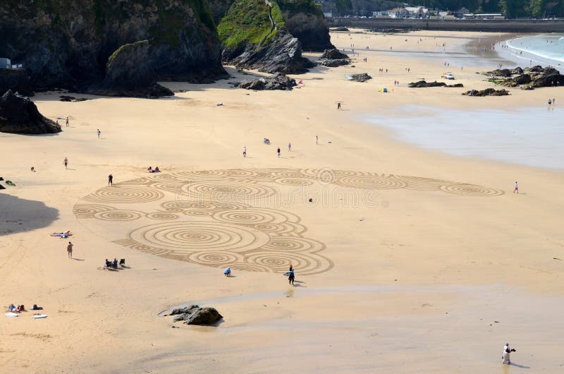 Sandkunst an Tolcarne-Strand, Newquay Stockbild - Bild von kreisförmig ...