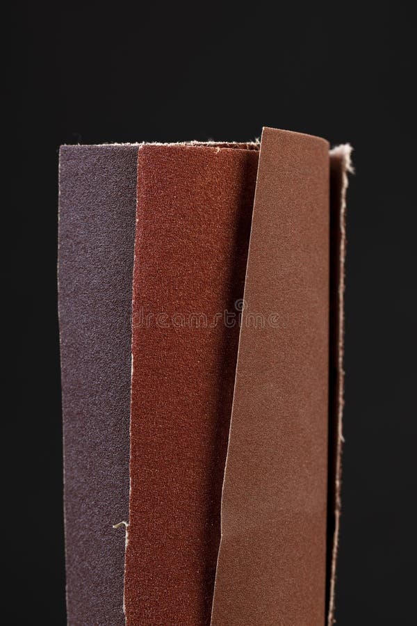 Three Different Types of Sandpaper are Rolled into a Tube Stock Image ...