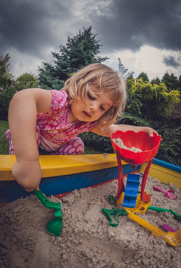 Sandpit fun stock photo. Image of happy, blue, alone - 47180138